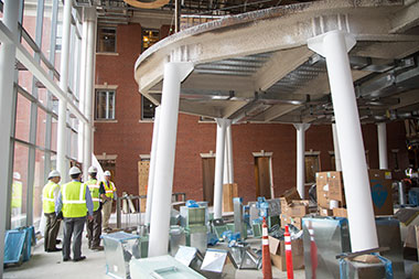 Fr. Shanley and Cabinet members tour the site with Mark Rapoza and Tim ...
